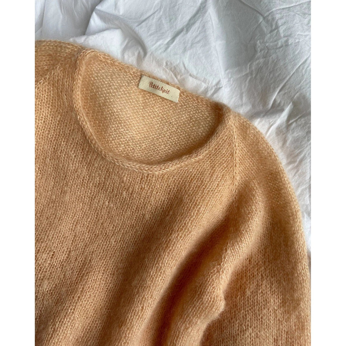 Cumulus O-neck Blouse Knitting Pattern by PetiteKnit at Knitnstitch