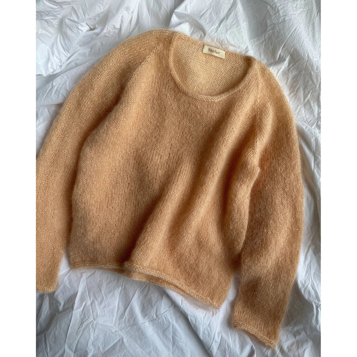 Cumulus O-neck Blouse Knitting Pattern by PetiteKnit at Knitnstitch